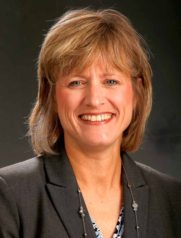 JenniferWinking-WEB-600x791 | | Workers’ Comp Executive