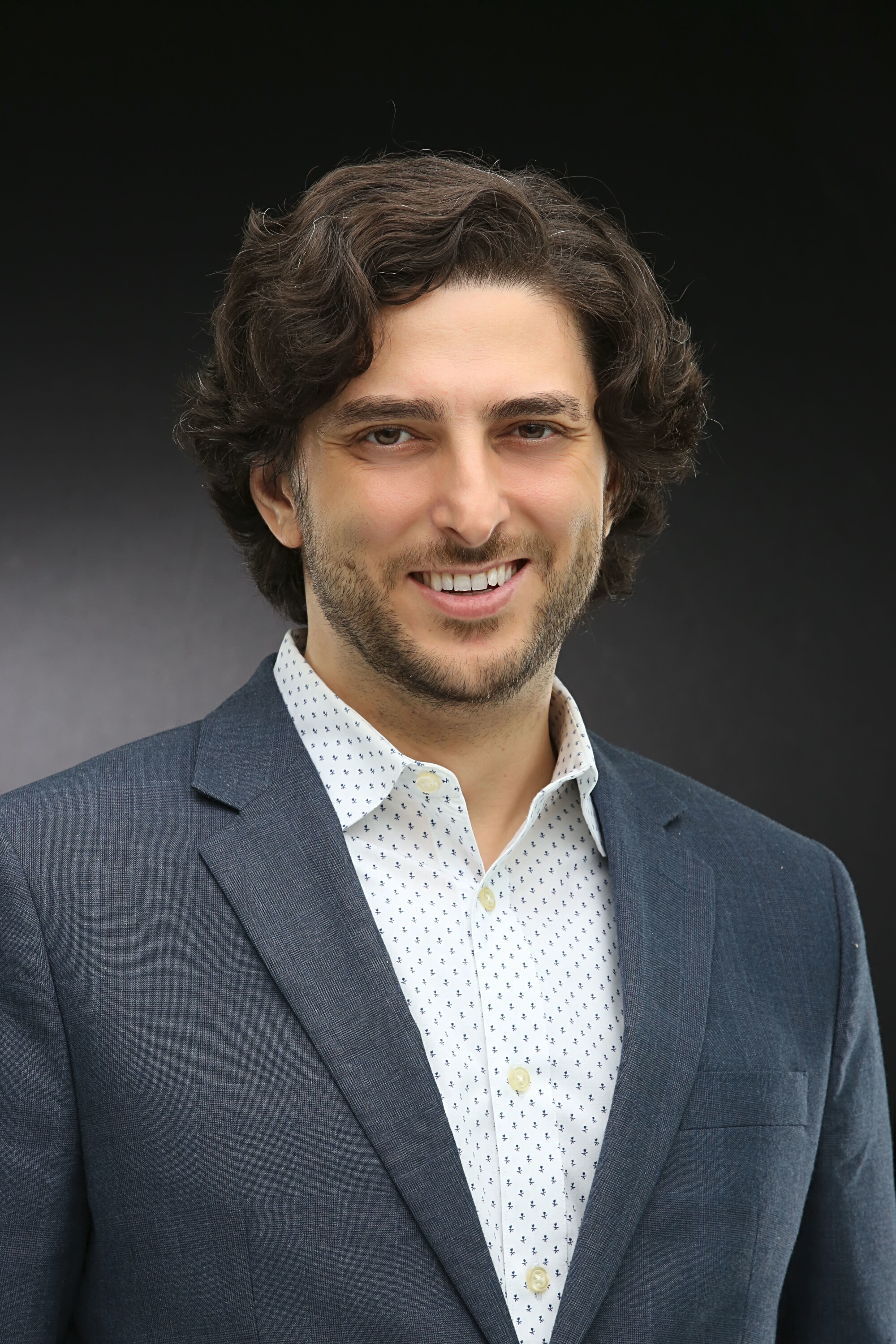 Omar Headshot | | Workers’ Comp Executive