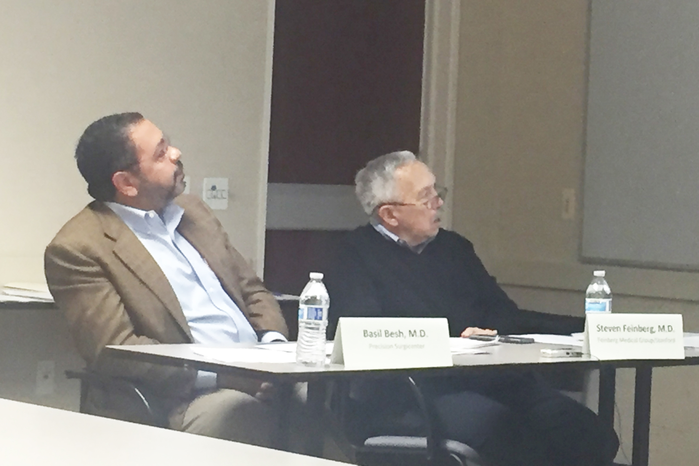 Dr. Basil Besh left Dr. Steven Feinberg center | | Workers’ Comp Executive